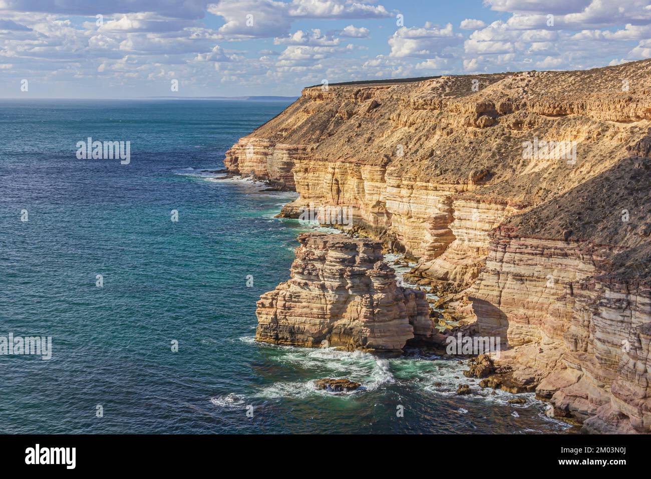 The view of Castle Cove with precarious coastal rock formation called ...