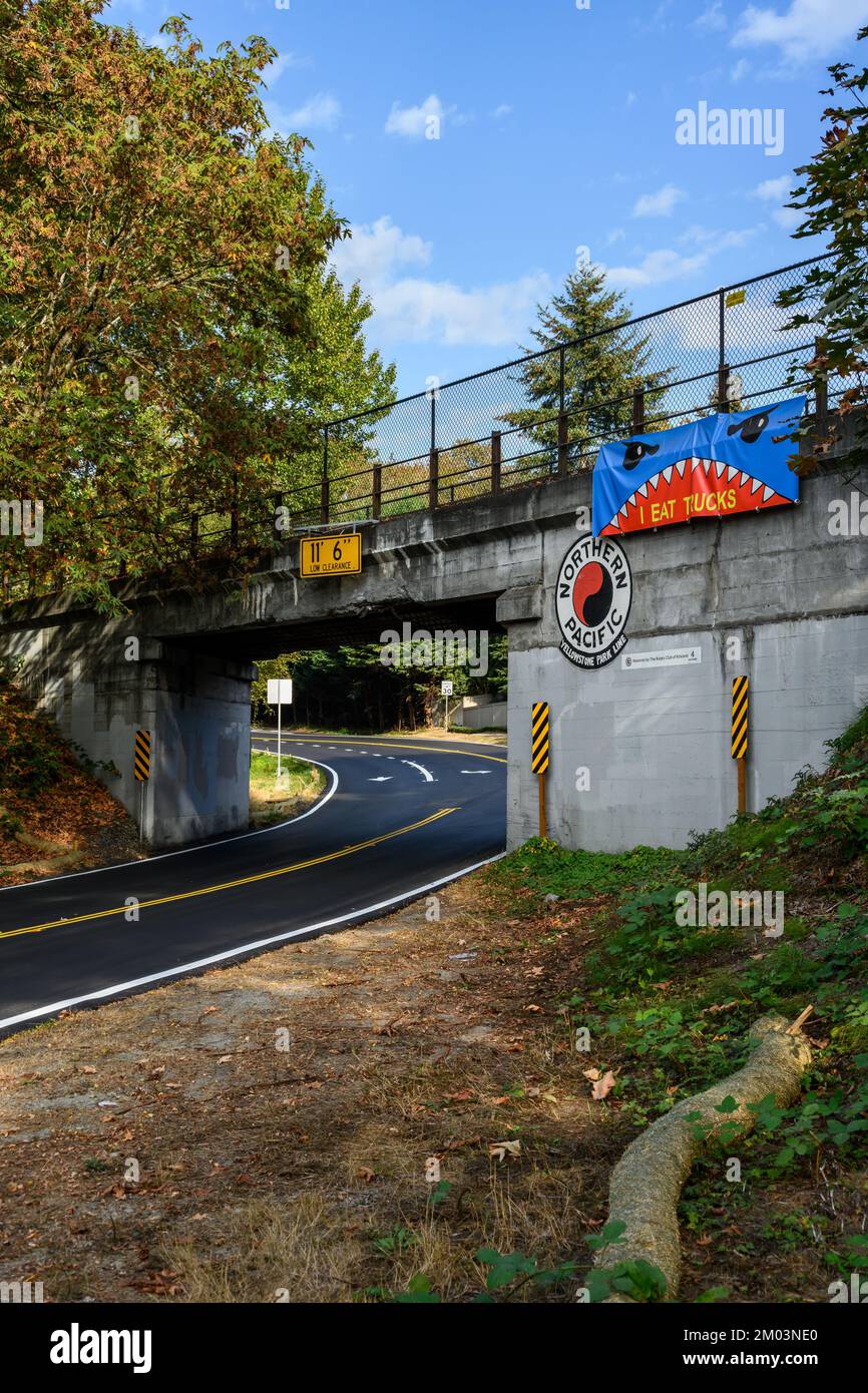 KIRKLAND, WA, USA – OCTOBER 10, 2022: Funny sign on railroad bridge ...