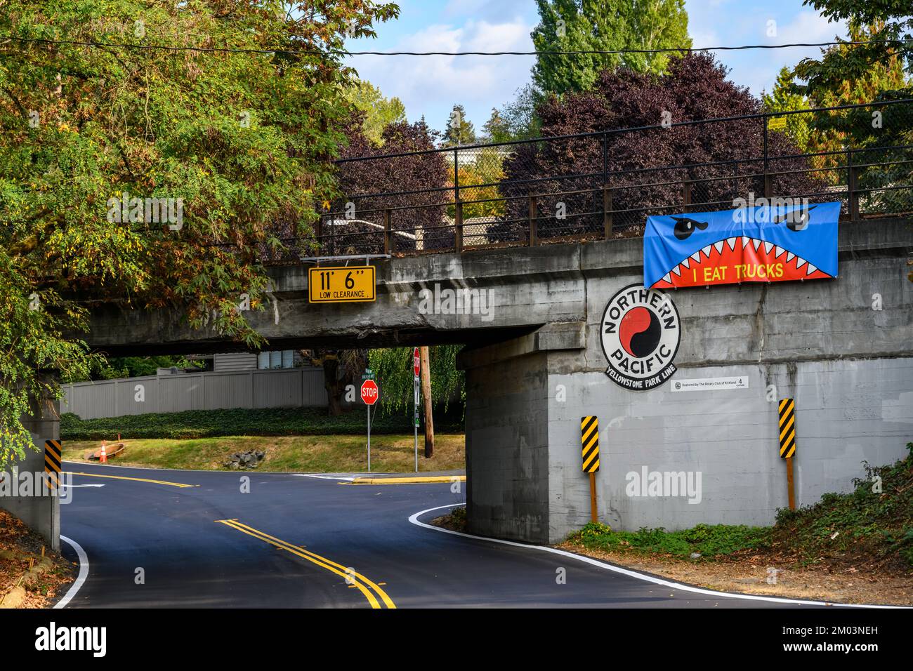 KIRKLAND, WA, USA – OCTOBER 10, 2022: Funny sign on railroad bridge ...