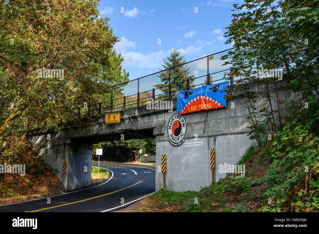 KIRKLAND, WA, USA – OCTOBER 10, 2022: Funny sign on railroad bridge ...