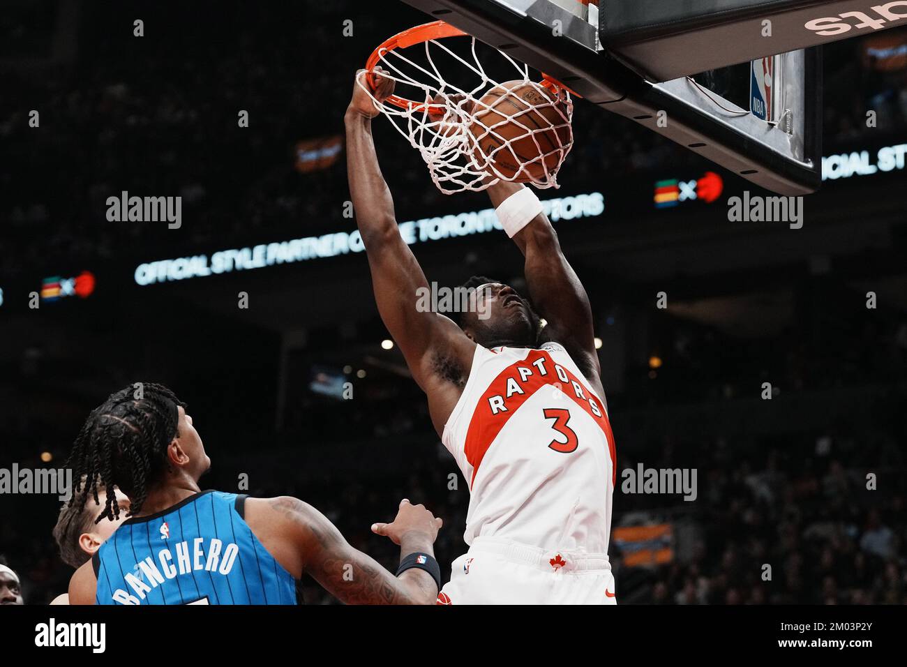 Toronto Raptors' O.G. Anunoby dunks on Orlando Magic’s Paolo Banchero ...
