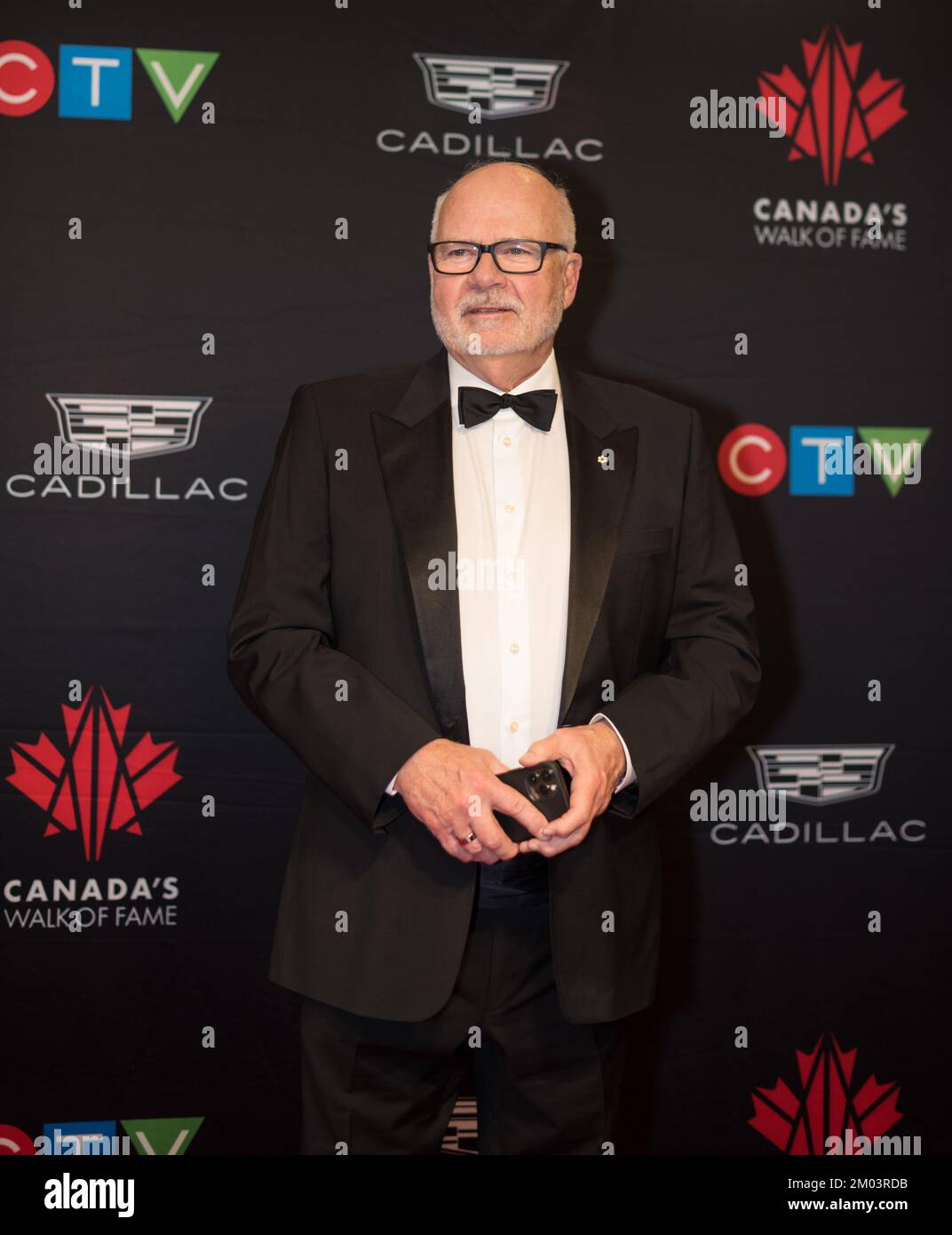 Peter Mansbridge, poses for a photograph on the red carpet for the 2022 ...