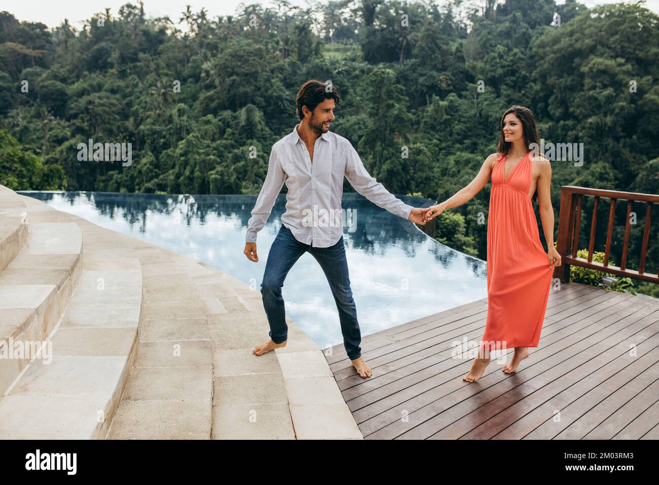 Woman walking swimming pool hi-res stock photography and images - Alamy