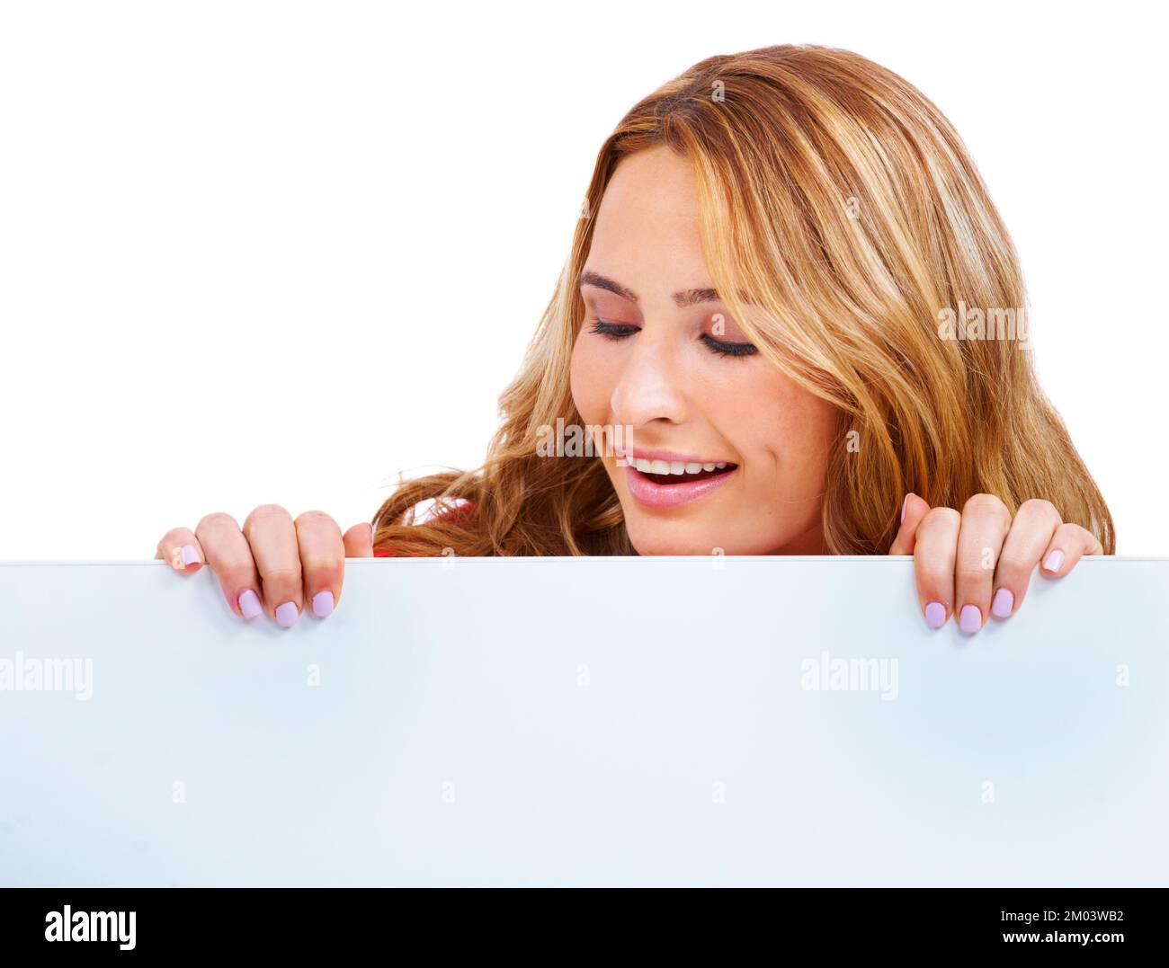 Beautiful young woman peeking behind hi-res stock photography and ...