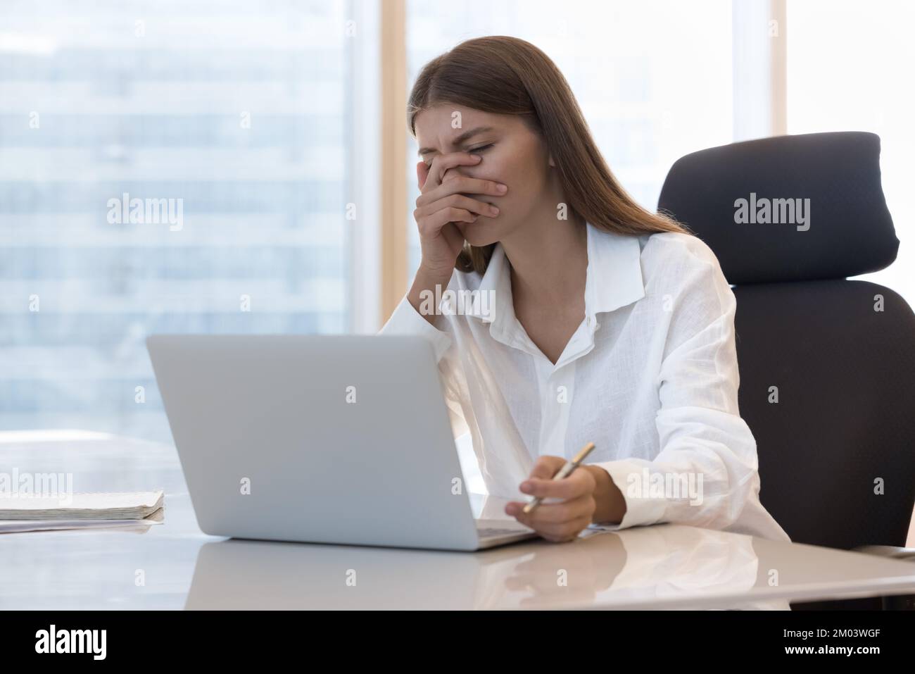 Tired frustrated office employee girl getting problems with laptop ...