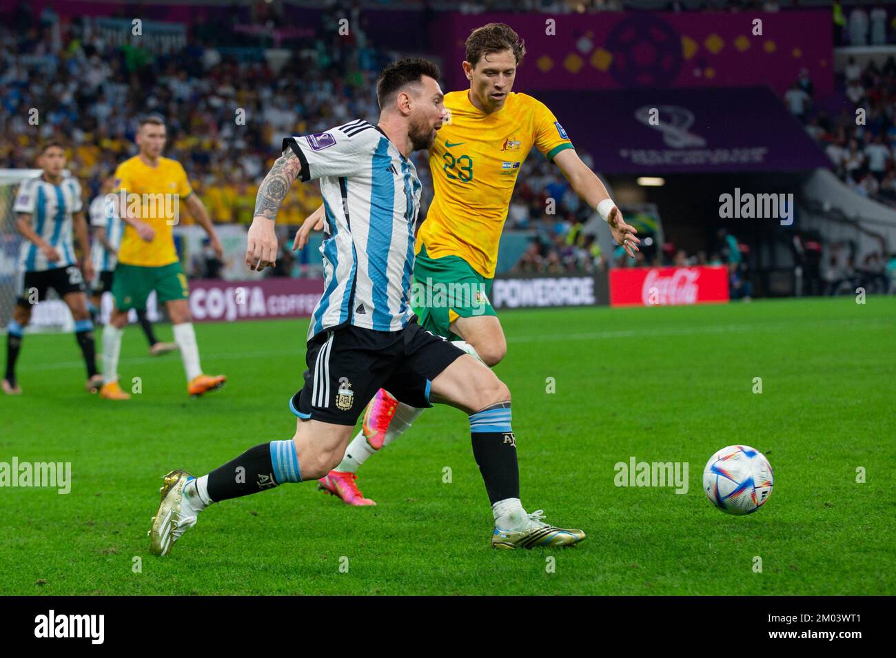Lionel Messi of Argentina and Craig Goodwin of Australia during the ...
