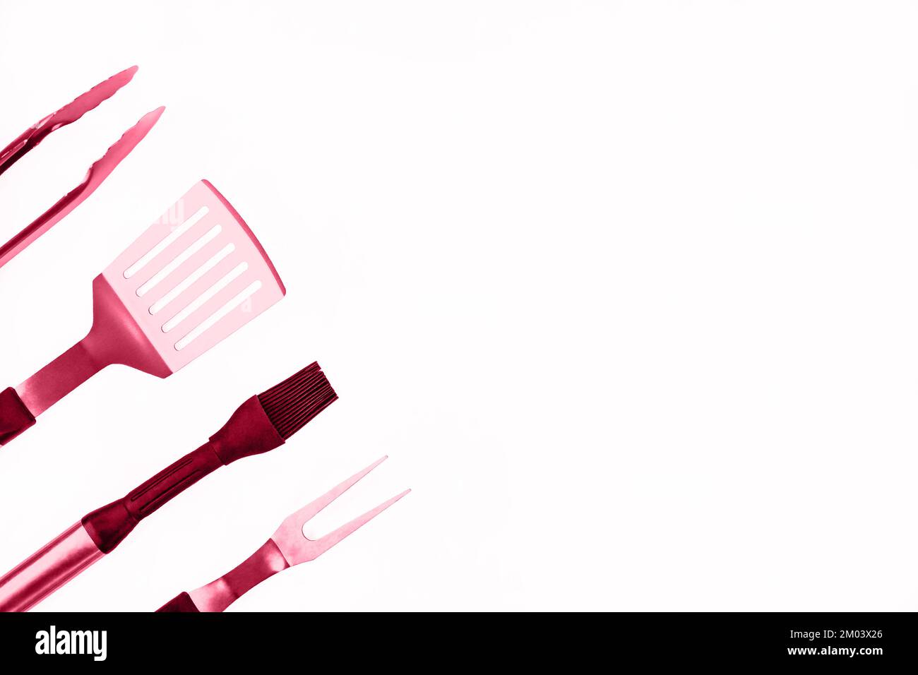 Color of year 2023 Viva Magenta. Image with barbecue utensils is toned ...