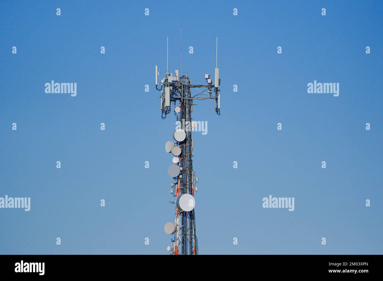 RF Communication transmission towers under cloudy sky Stock Photo - Alamy