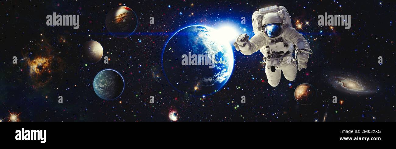 Astronaut spaceman working for space station in outer space .Elements ...