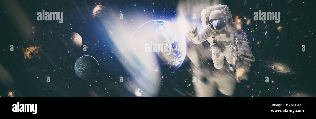 Astronaut spaceman working for space station in outer space .Elements ...