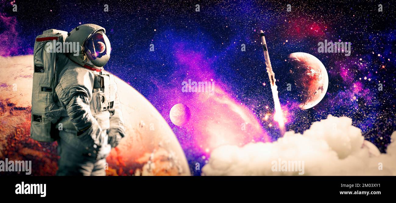 Astronaut spaceman working for space station in outer space .Elements ...