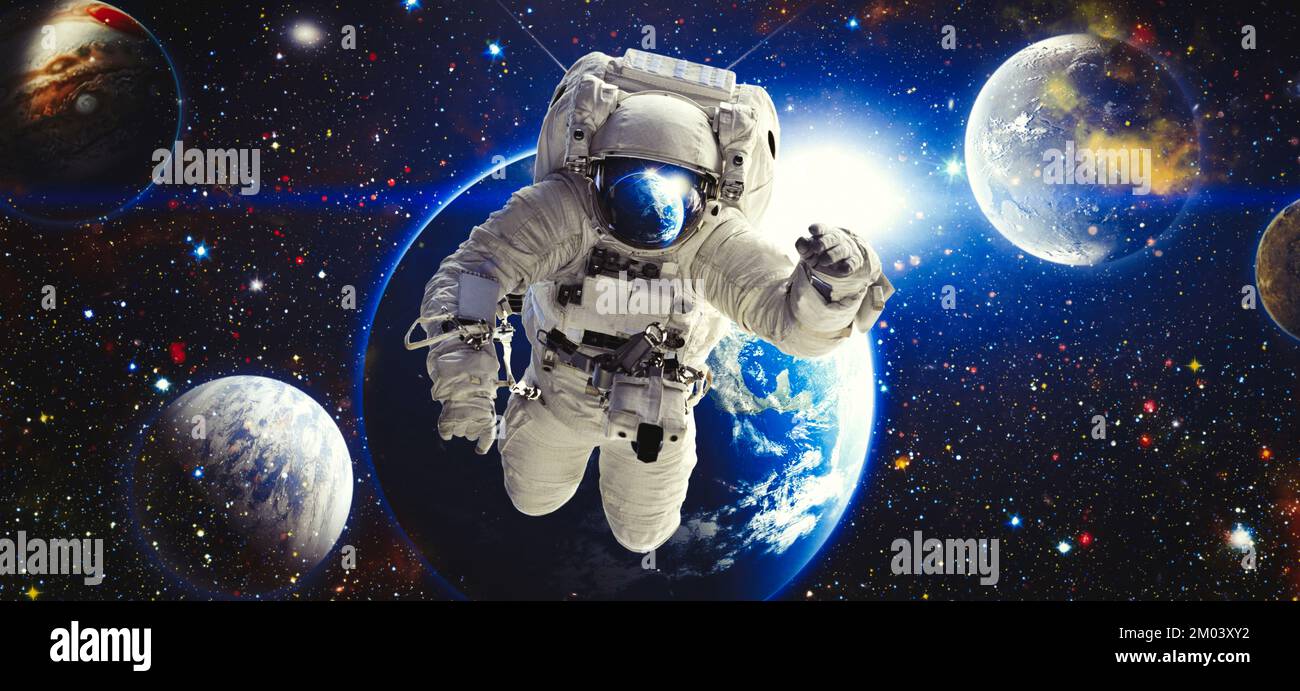Astronaut spaceman working for space station in outer space .Elements ...