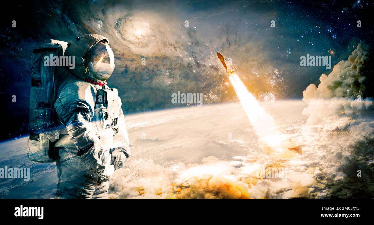 Astronaut spaceman working for space station in outer space .Elements ...