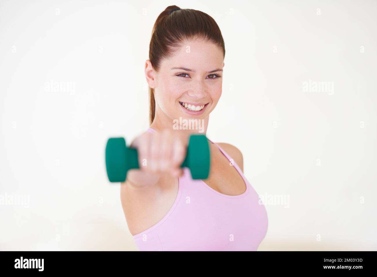 Staying upbeat and toned. Portrait of a positive-looking young woman ...