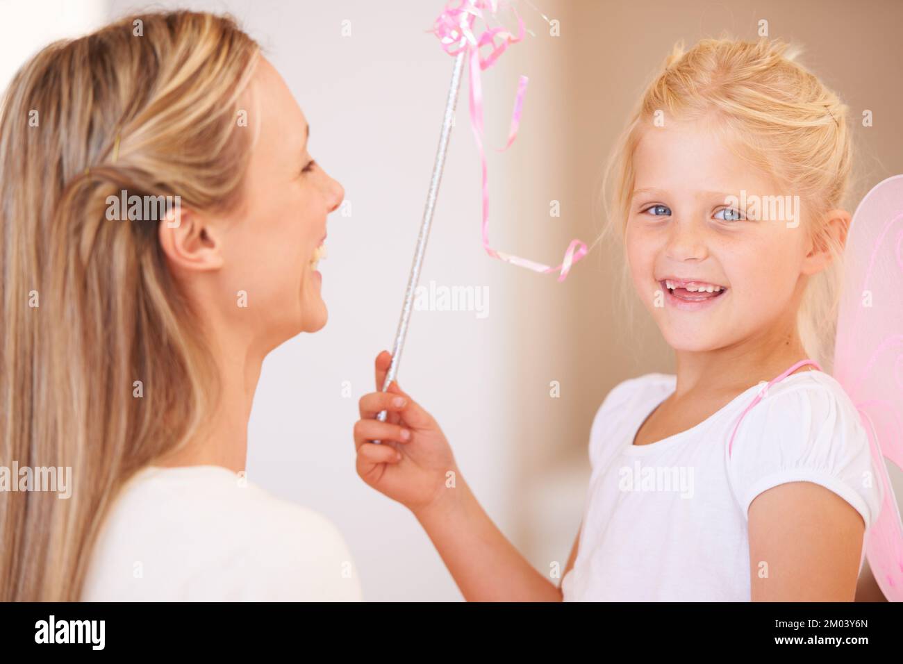 Shell grant her mum any wish she wants. Portrait of a smiling girl ...