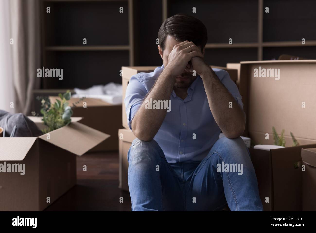 Sad desperate depressed homeowner, renter man leaving out from ...