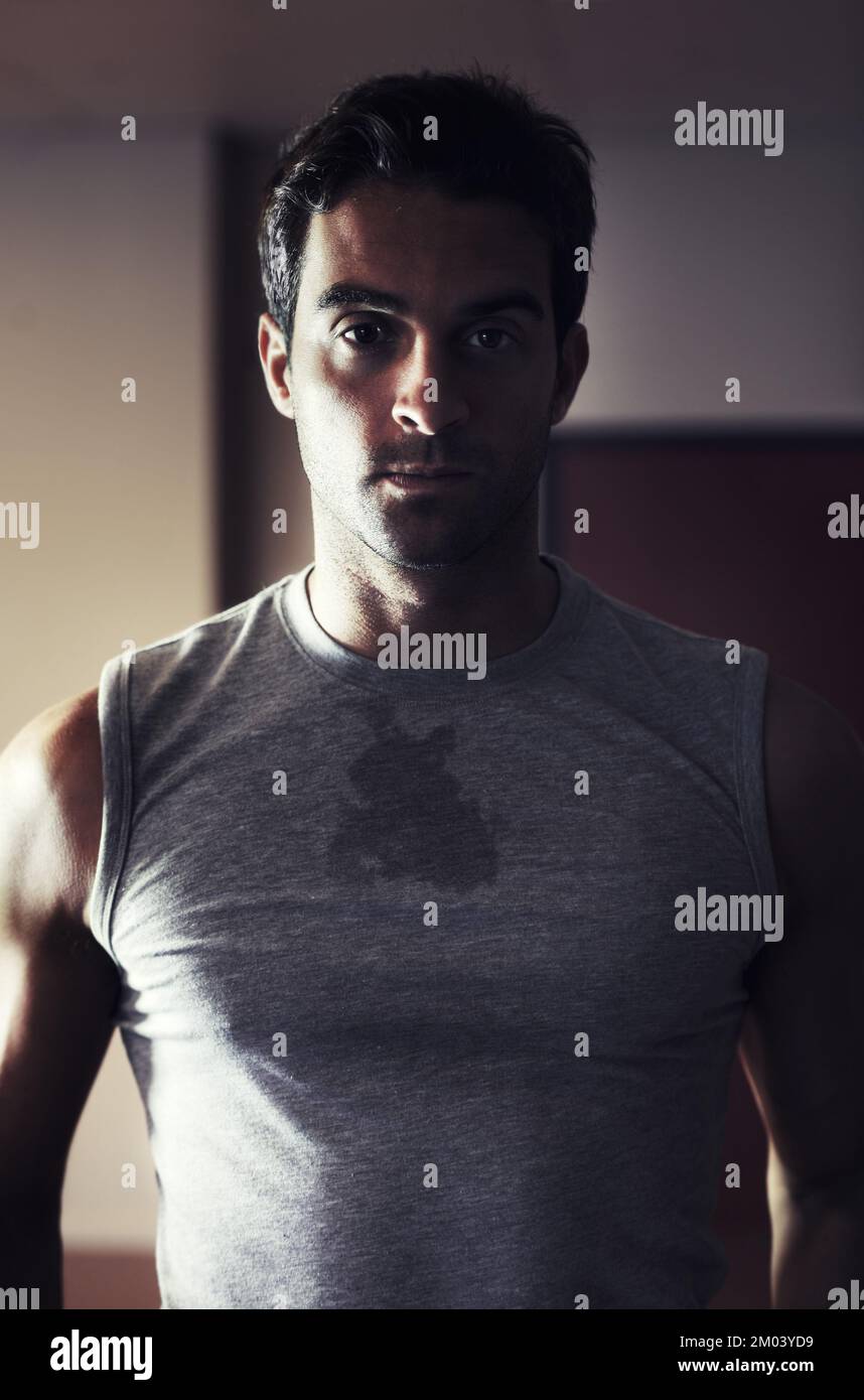 Portrait of masculin perfection. Portrait of a sweaty handsome man ...
