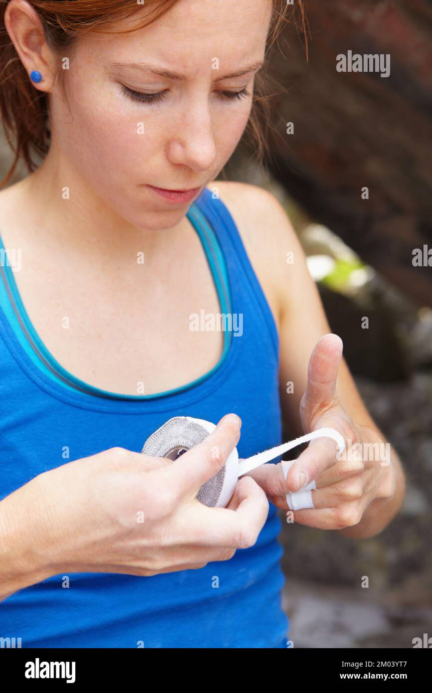 This will help immensely with her grip. Closeup of a rock climber ...