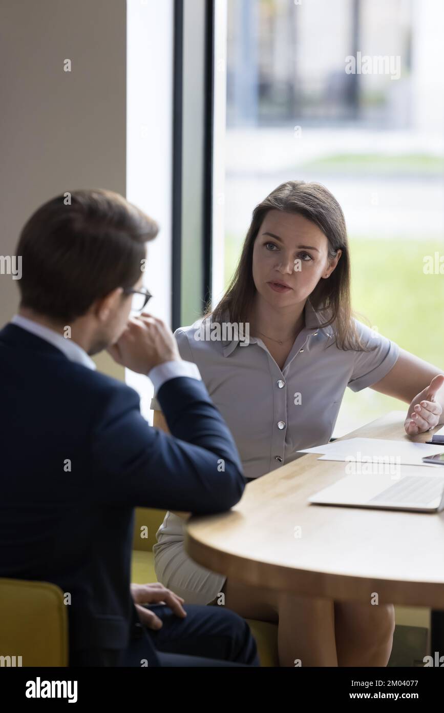 Two people talking serious hi-res stock photography and images - Alamy