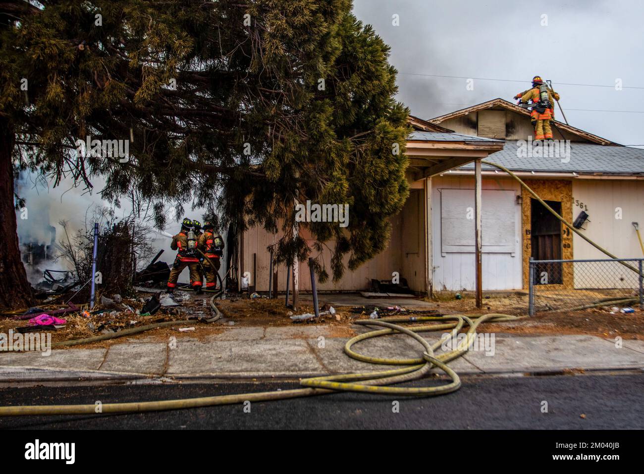 Reno, United States. 03rd Dec, 2022. Firefighters work on an empty ...