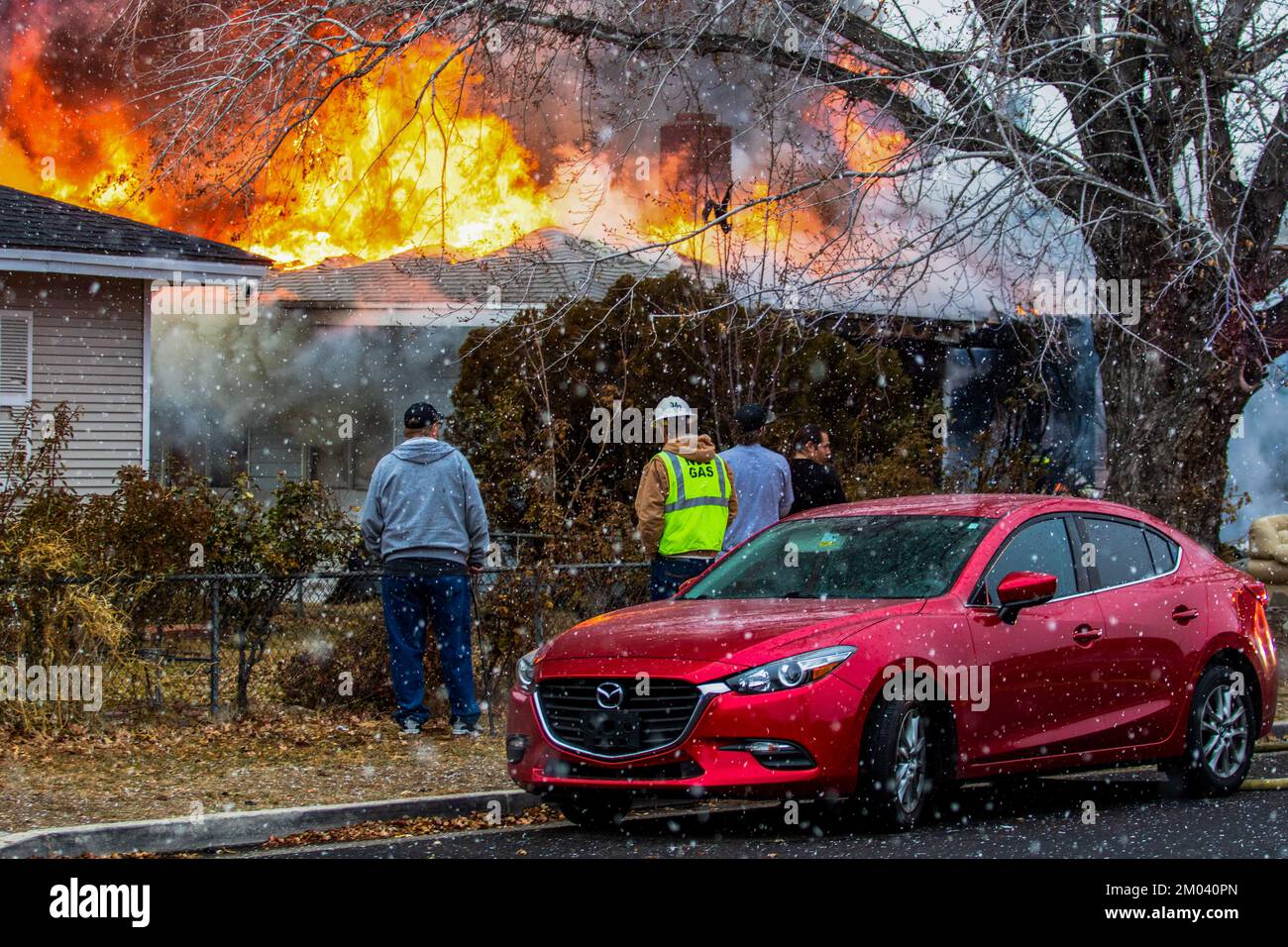 An unoccupied home burns through the roof. Two unoccupied homes burned ...