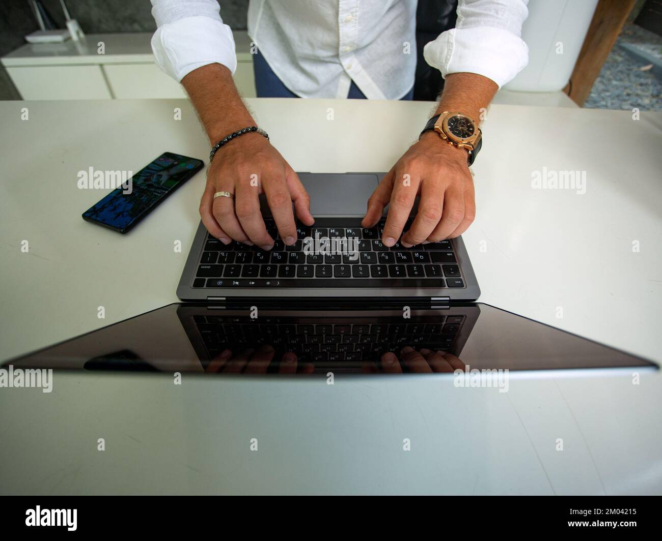 Male hands working on hi-res stock photography and images - Alamy
