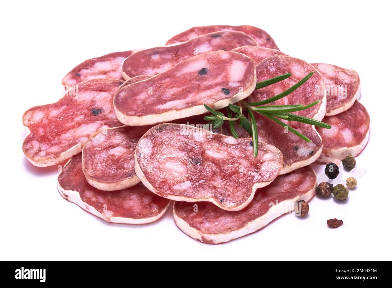 slices of Spanish Fuet thin dried salami sausage isolated on a white ...