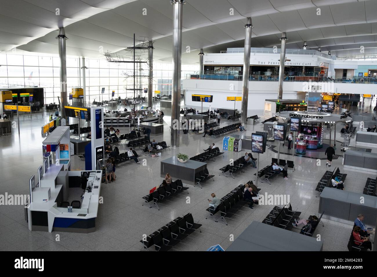 People in waiting room at Heathrow airport terminal 2 in London ...