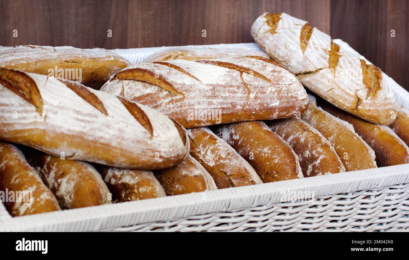 Freshly-baked goodness. Loaves of delicious bread packed in a basket ...