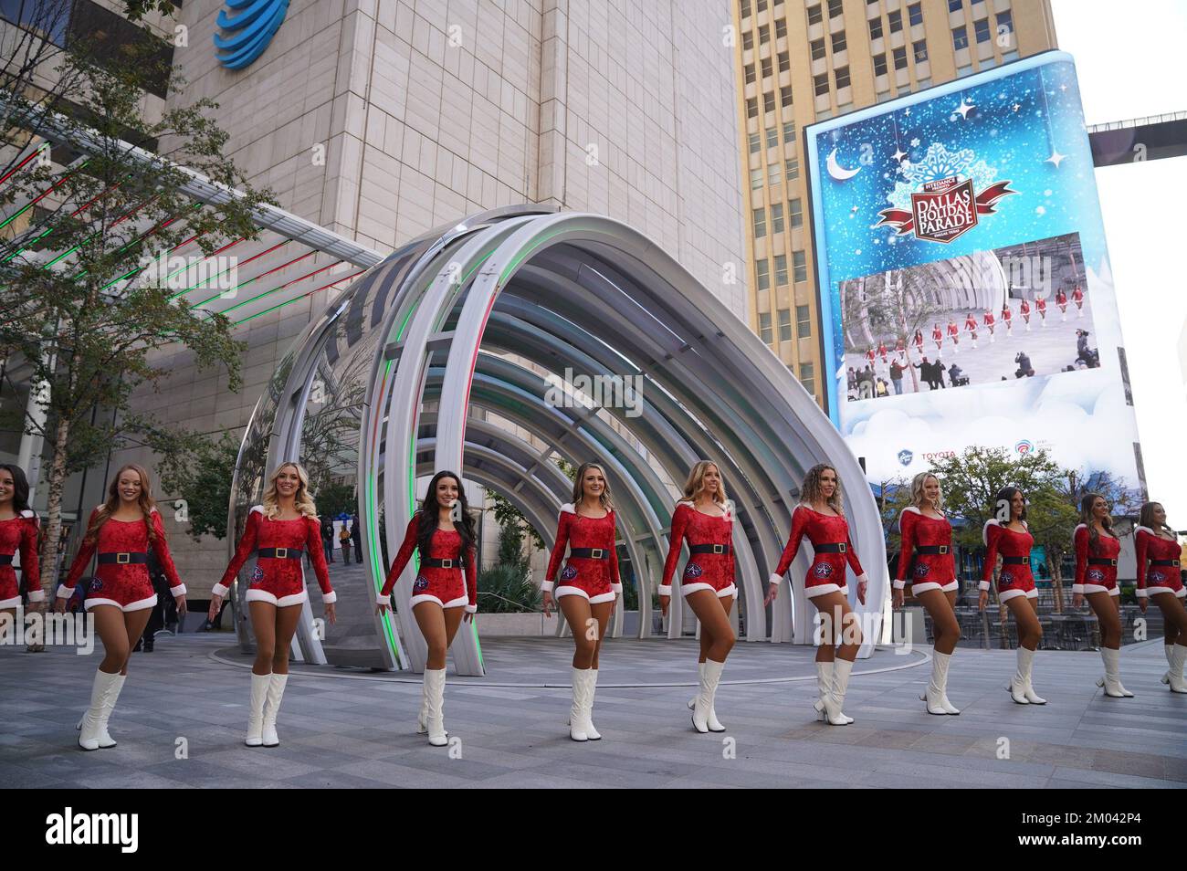 Dallas, Texas, USA. 3rd Dec, 2022. Women dressed as Santa perform at ...