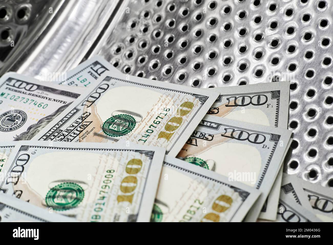 Close-up of washing dollars in machine, money laundering, financial ...