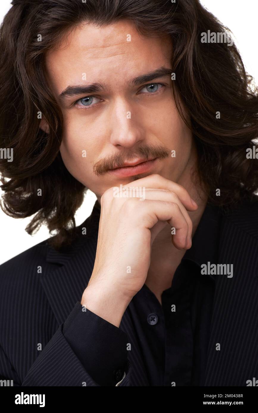 Well hello there. Closeup of a young man posing with his hand on his ...