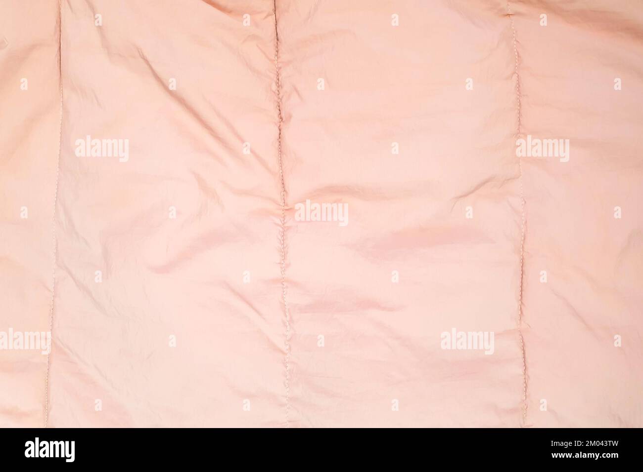 Down jacket fabric background, light pink puffer jacket texture Stock ...