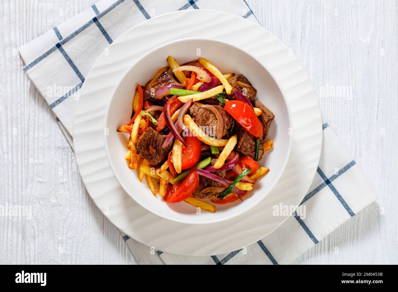 Lomo saltado, Peruvian dish of stir-fried slices of beef sirloin ...