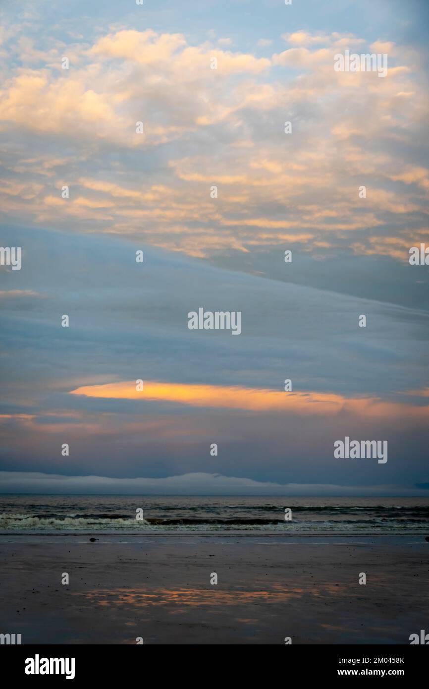 Pink clouds over sea, Orewa, Auckland, North Island, New Zealand Stock ...