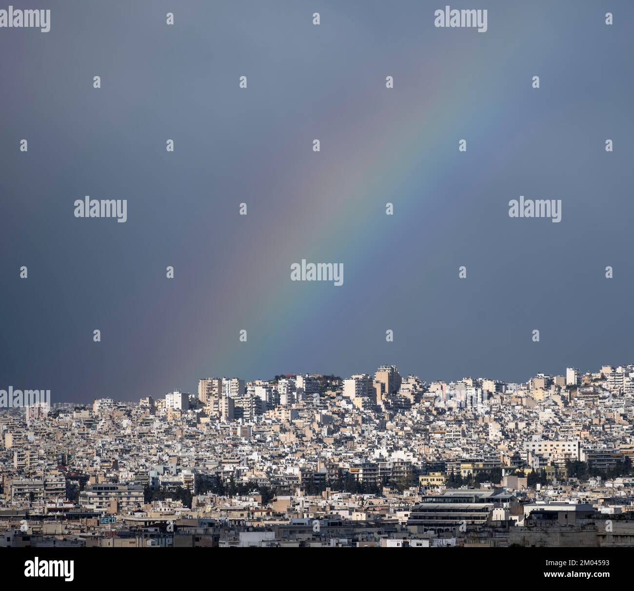 View over the sea of houses of Athens, with rainbow, Athens, Attica ...