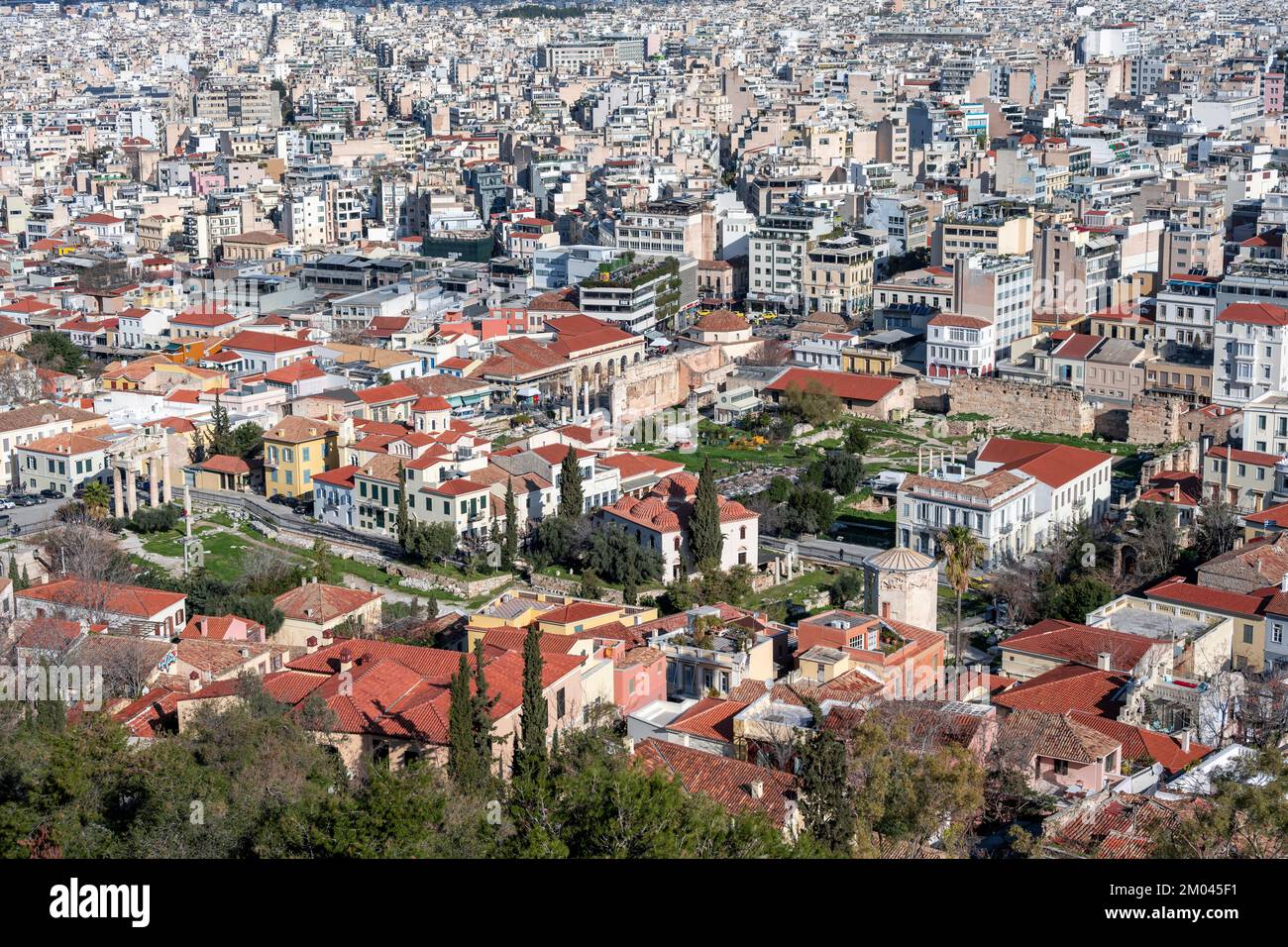 View over the sea of houses of Athens, Old Town of Athens with Roman ...