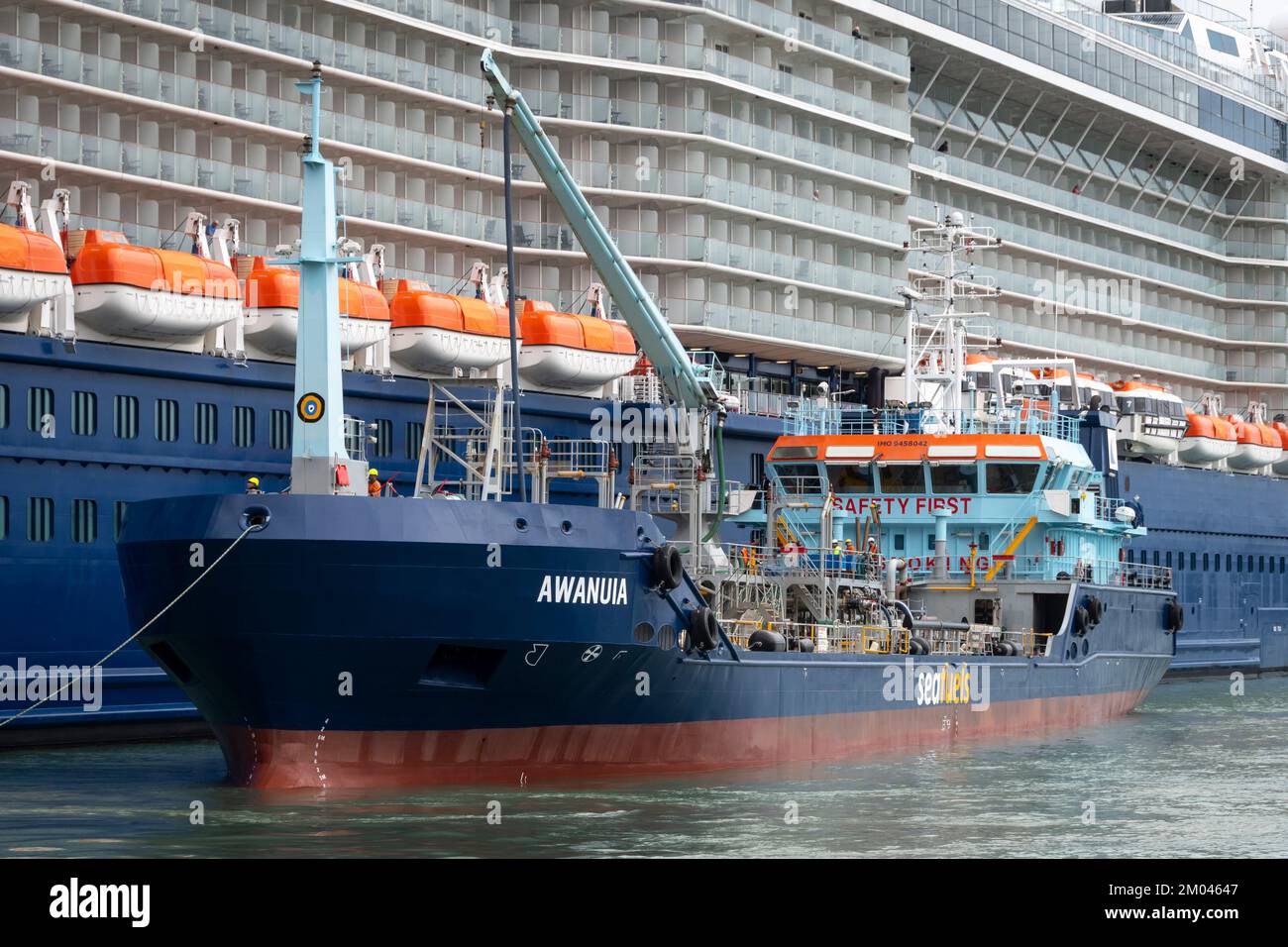 Tanker refueling cruise ship "Celebrity Eclipse" at Auckland, North ...