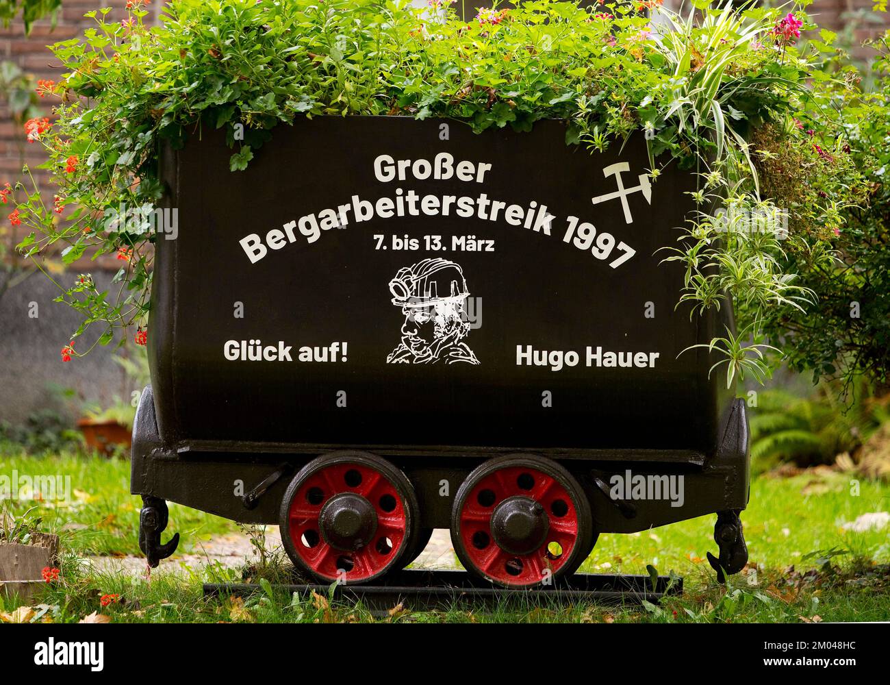 Coal lorry in the front garden commemorating the big miners' strike in ...