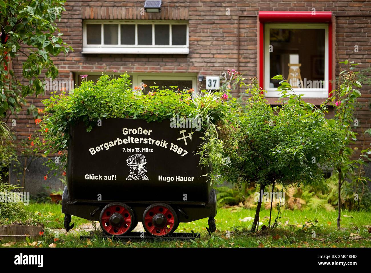 Coal lorry in the front garden commemorating the big miners' strike in ...