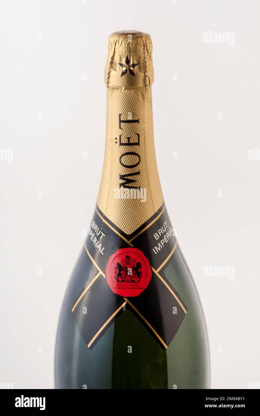 Closeup sealed bottle of expensive Moet Chandon champagne placed ...