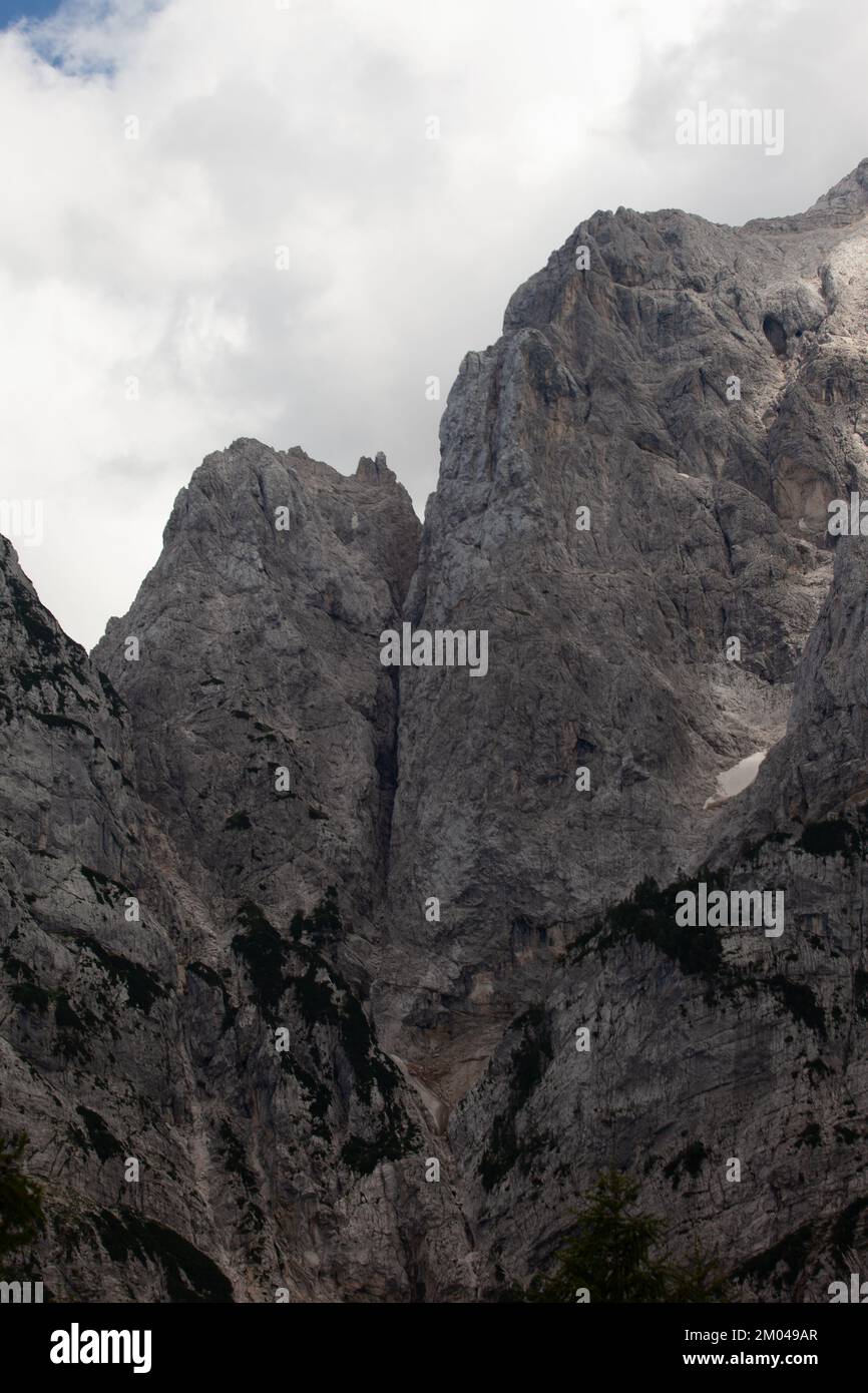 The rocky peaks and clouds of Triglav National Park Slovenia Stock ...