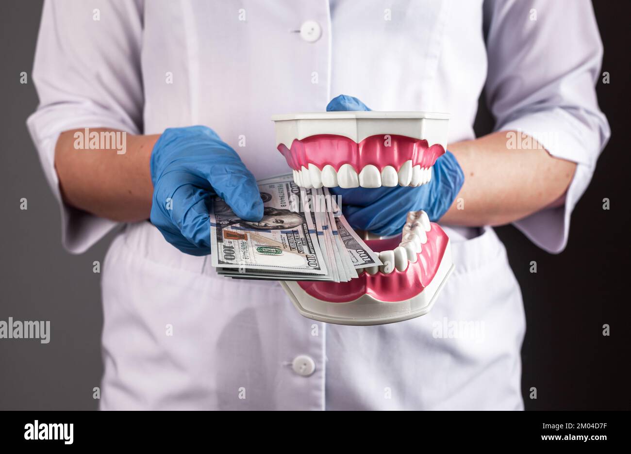 Money bills and teeth hi-res stock photography and images - Alamy
