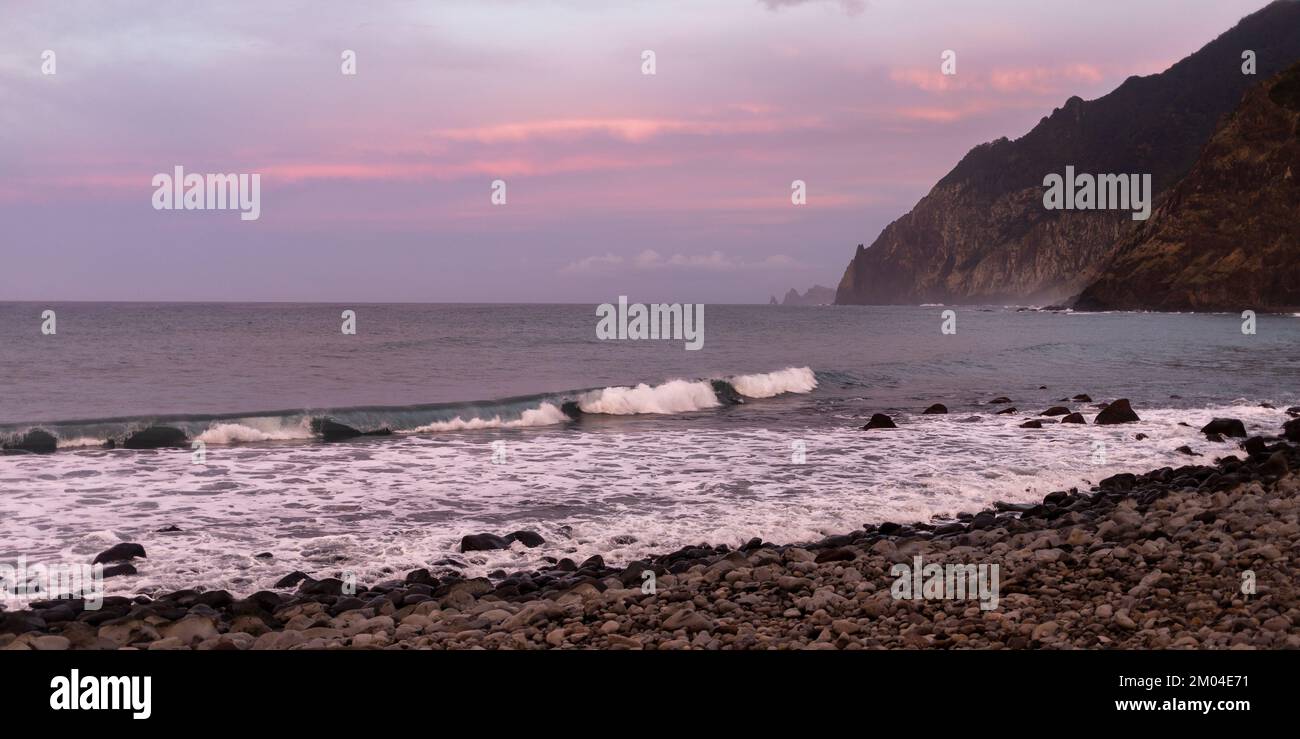 sunset view ocean and rocks beautiful background Stock Photo - Alamy