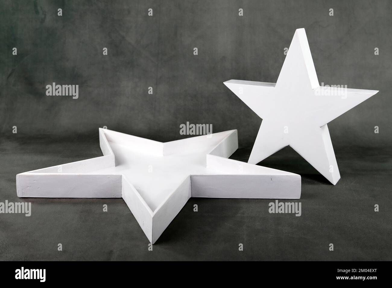Two white coloured isolated wooden stars Stock Photo - Alamy