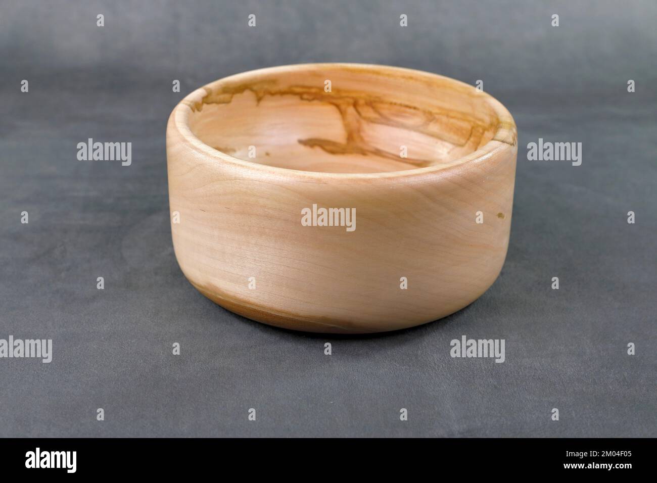 A pretty turned wooden bowl, made from basswood Stock Photo - Alamy