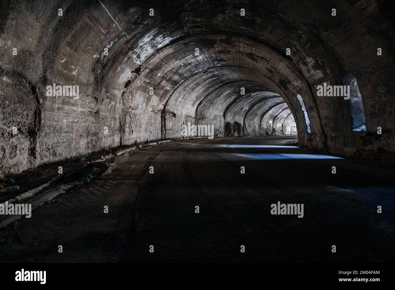 Old underground road tunnel inside mountain Stock Photo - Alamy