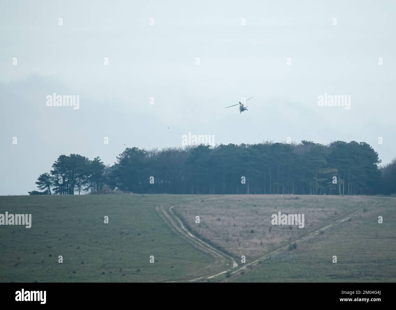 British army Boeing Apache Attack helicopter (AH-64E ArmyAir606) in low ...