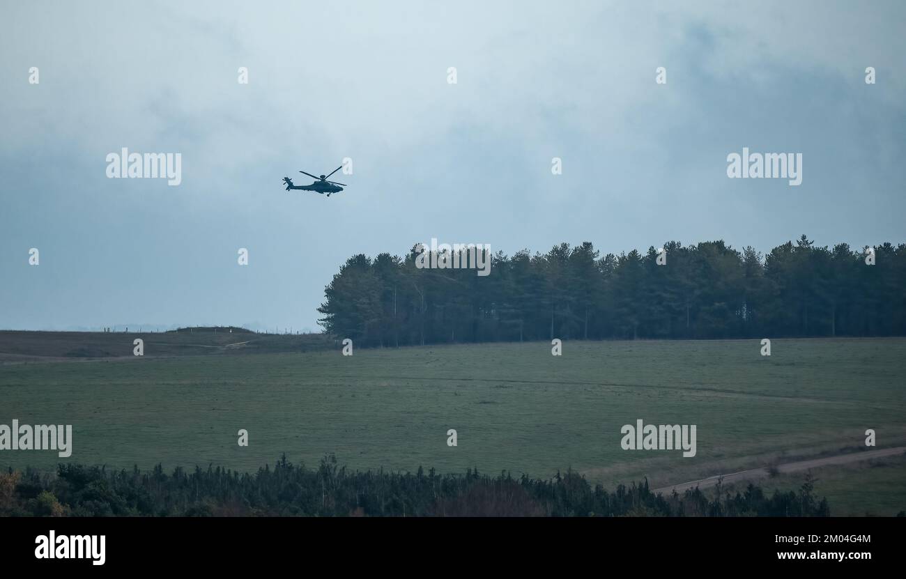 British army Boeing Apache Attack helicopter (AH-64E ArmyAir606) in low ...