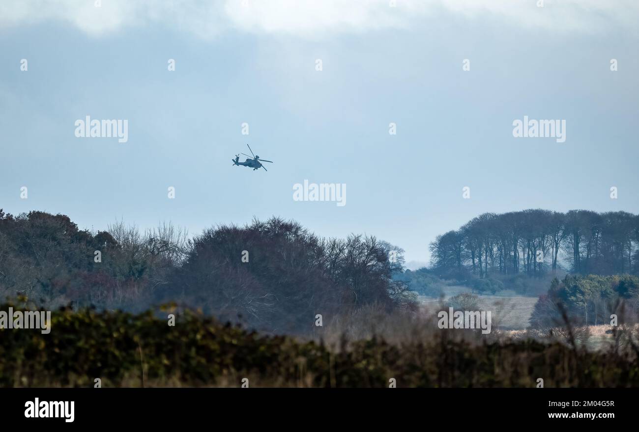 British army Boeing Apache Attack helicopter (AH-64E ArmyAir606) in low ...